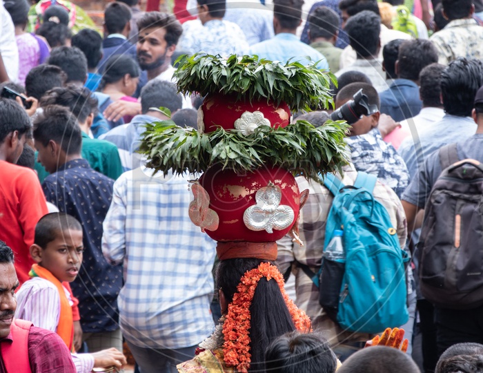 Image of A Woman Carrying Bonam or Bonalu On Her Head At Golconda ...