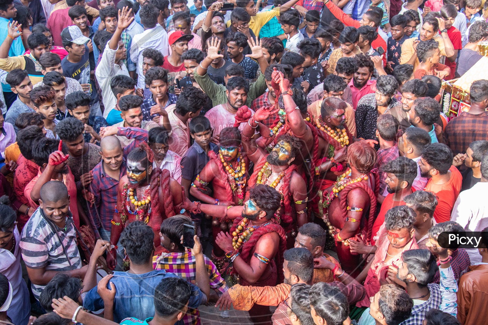Image of Pothuraju Being Beating And Dancing Along The Crowd With Red ...