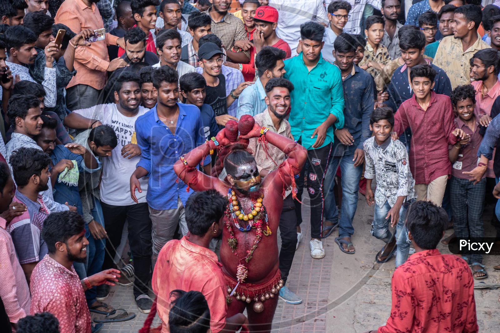 Image of Pothuraju Being Beating And Dancing Along The Crowd With Red ...