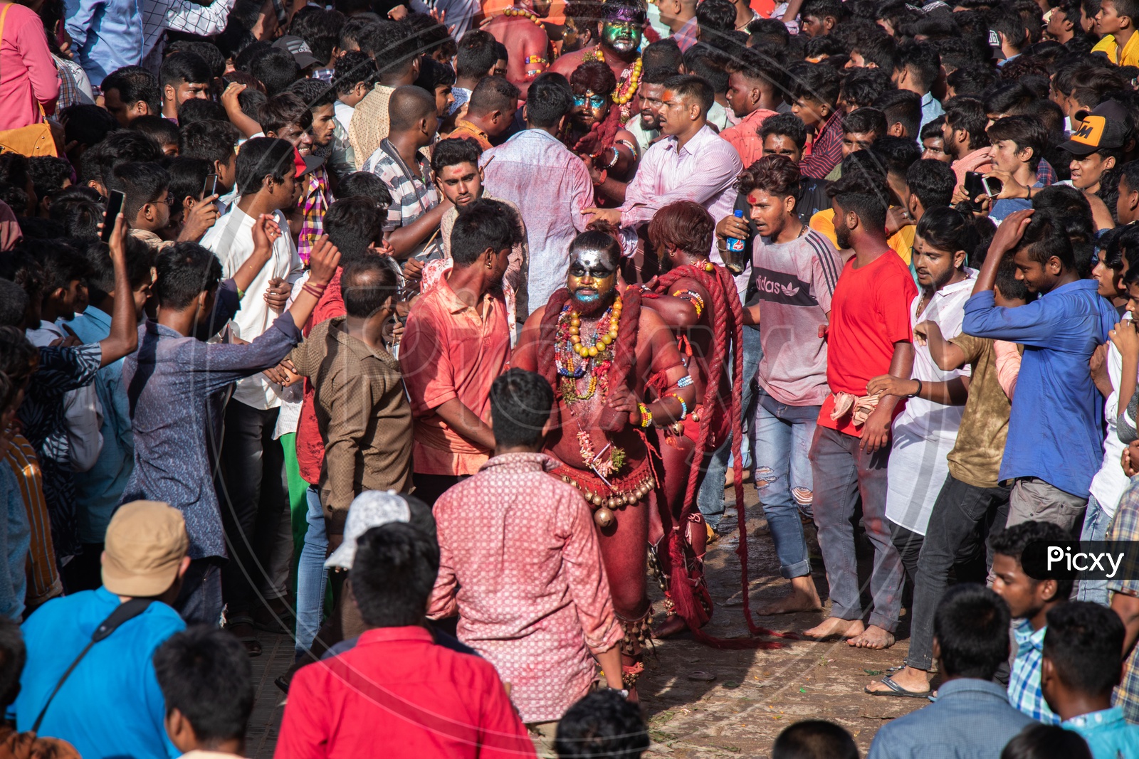Image of Pothuraju Being Beating And Dancing Along The Crowd With Red ...