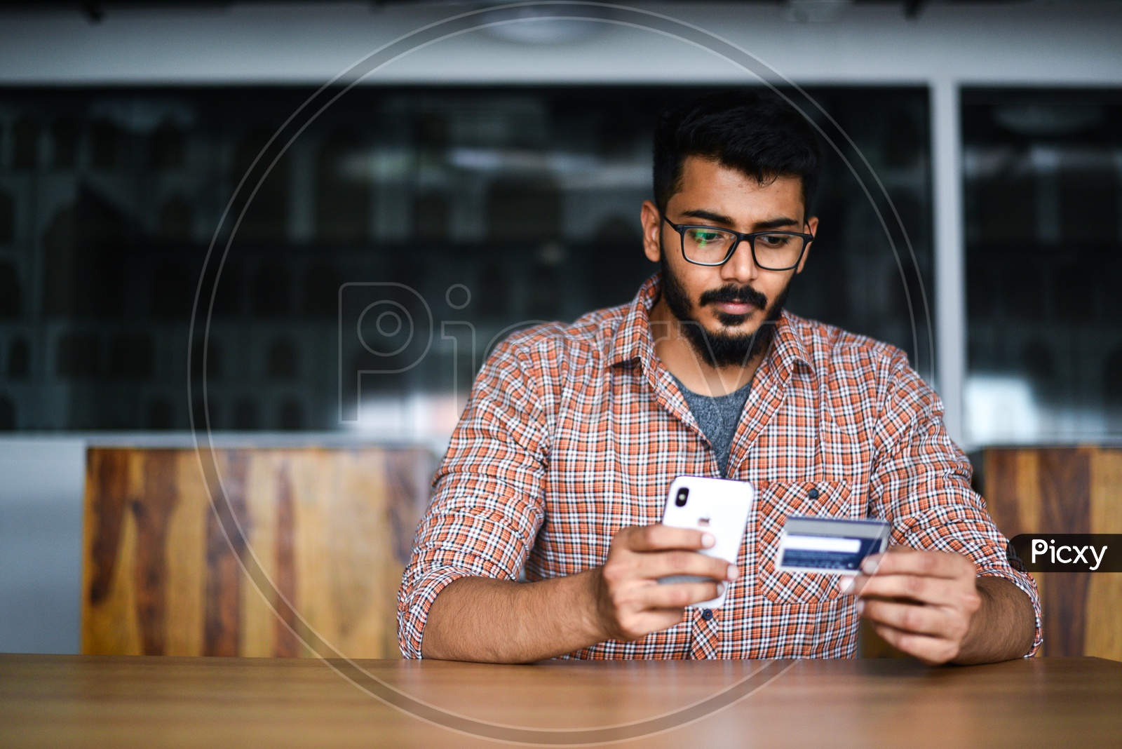 Image of Online Payments Or Online Shopping A Young Man Using Debit or ...