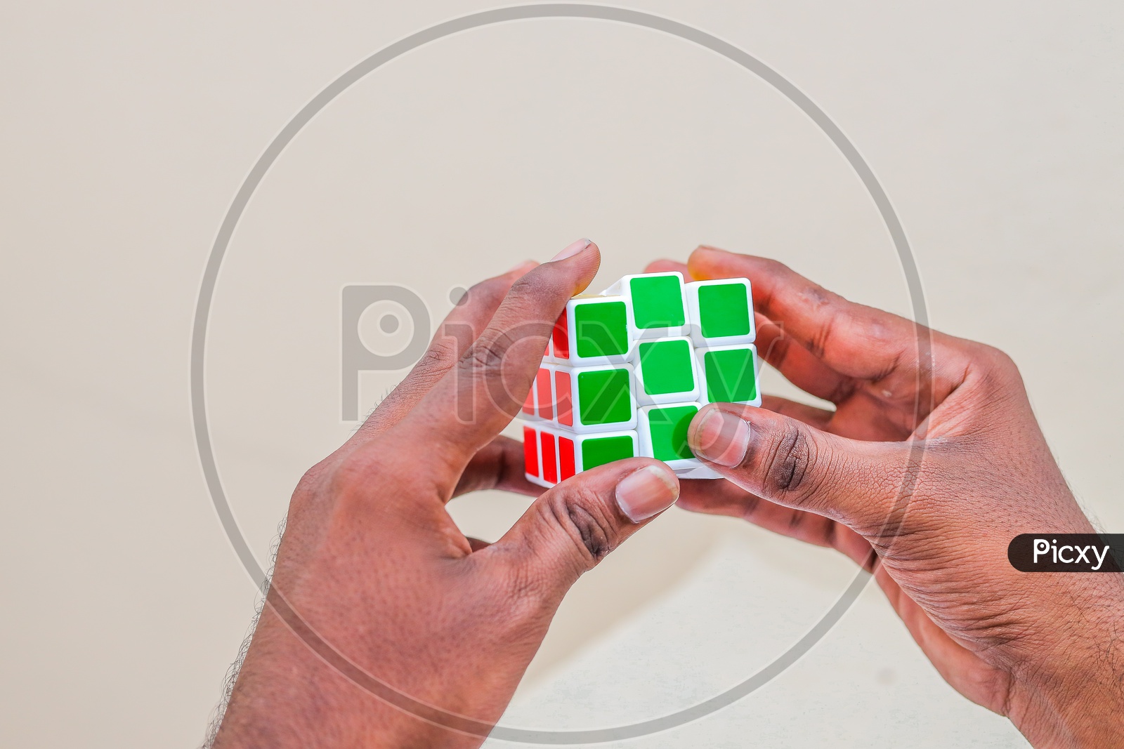 Image of Hands and Rubik's cube puzzle isolated on the white background ...