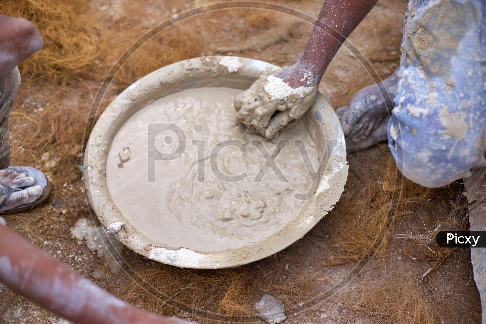 Image of Plaster of paris mixture used to make Ganesh statues.-KC801018 ...