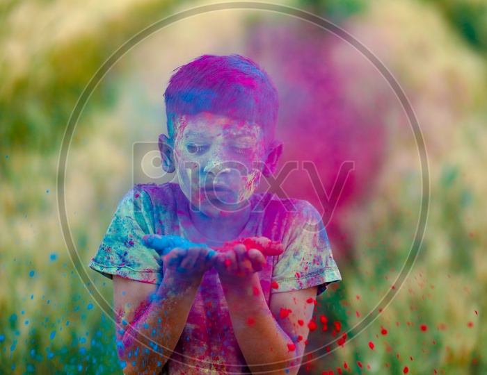 Image of Indian Boy or Young Indian Boy Playing Or Filled In Holi ...