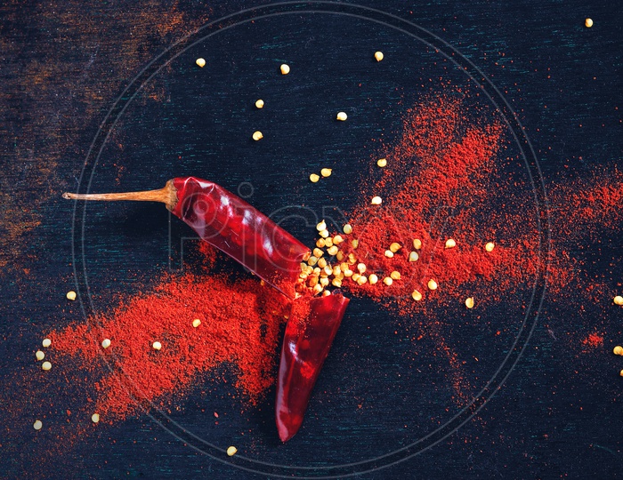 Image of Red Chilli Or Pepper Powder With Chilli Flakes On an Isolated ...