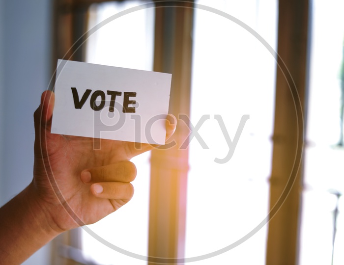 Image of Hands Showing Vote Note For Voting In Elections-BD220762-Picxy