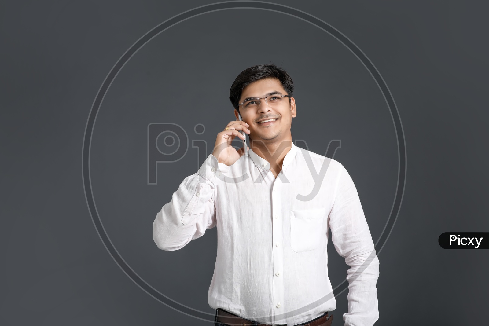 Image of Young Man or Indian Man Speaking In Smart Phone Or Mobile Over ...