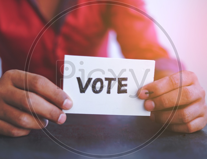 Image of Hands Showing Vote Note For Voting In Elections-BD220762-Picxy