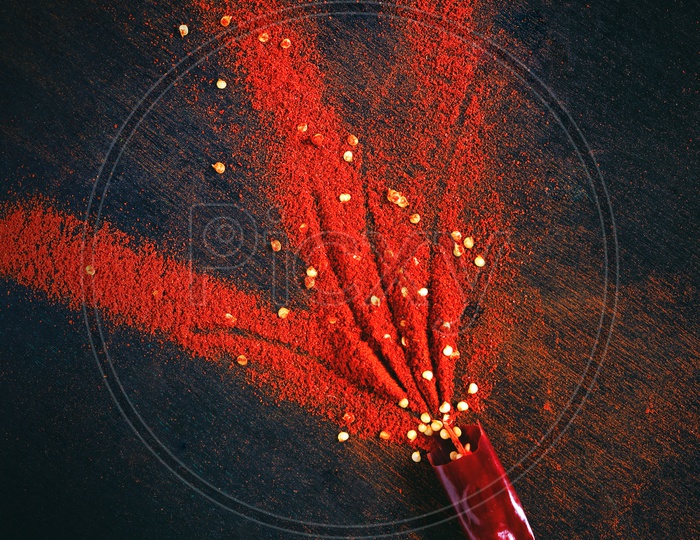Image of Red Chilli Or Pepper Powder With Chilli Flakes On an Isolated ...