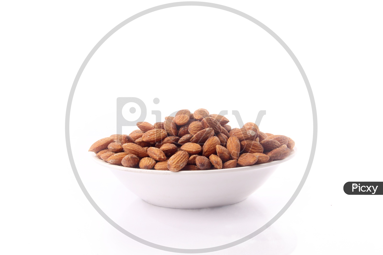 Image of Roasted Almonds Or Badam Nuts In a Bowl On an Isolated White ...