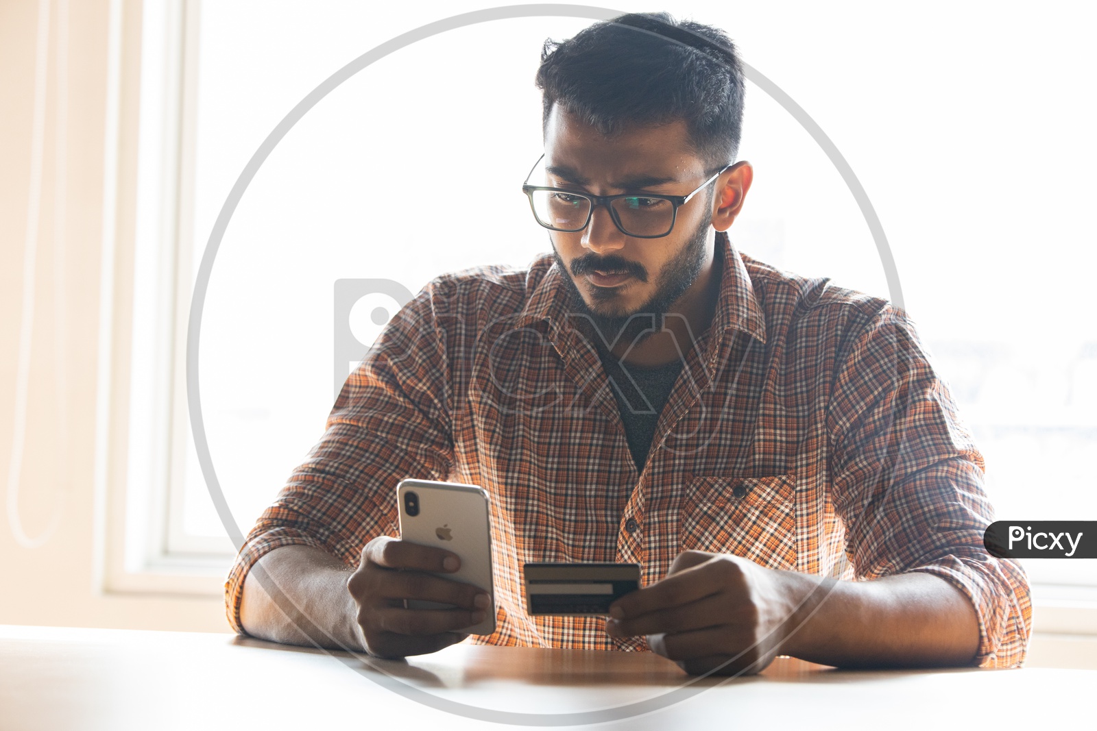 Image of Online Payments Or Online Shopping A Young Man Using Debit or ...