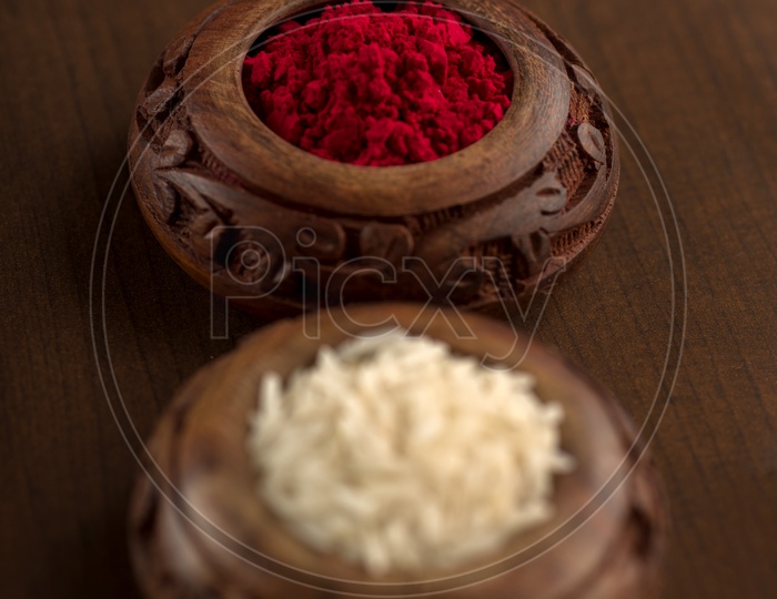 Image of Kumkum And Rice Grains For Hindu Worship In a Container on an ...