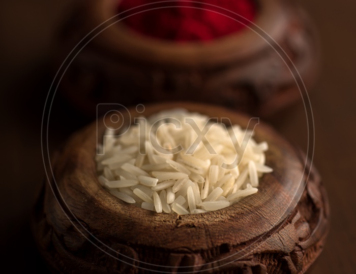 Image of Kumkum And Rice Grains For Hindu Worship In a Container on an ...