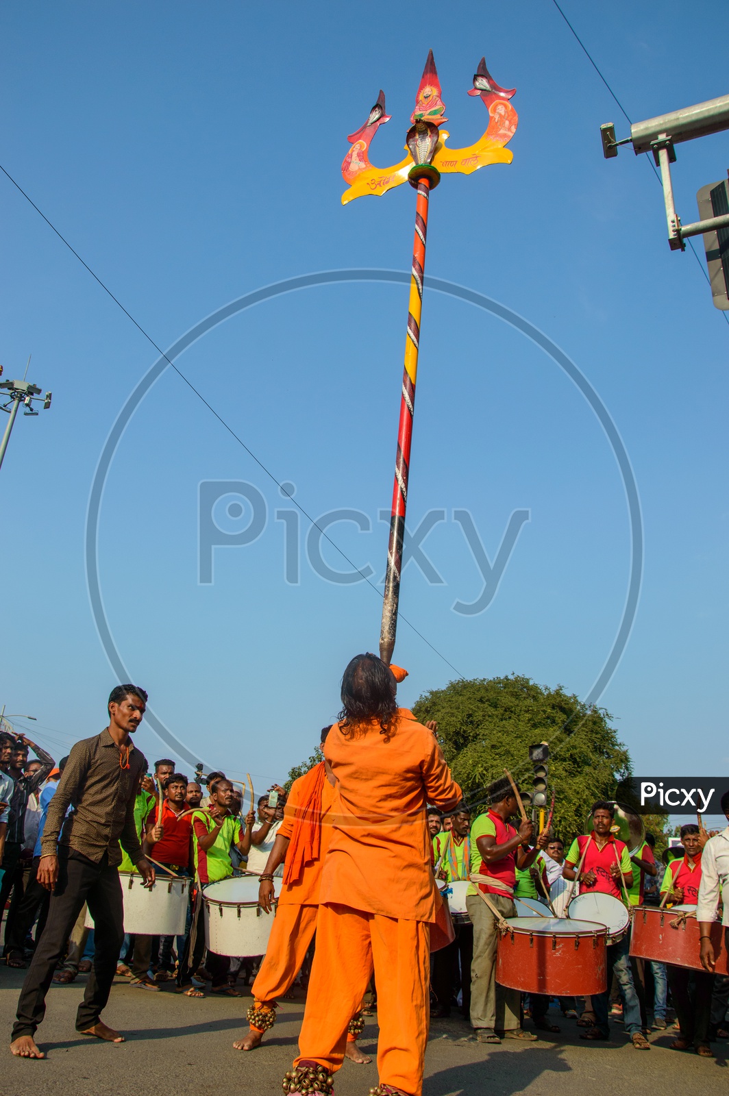 Image of A Man Performing With heavy Thrisul or trident on roads before ...
