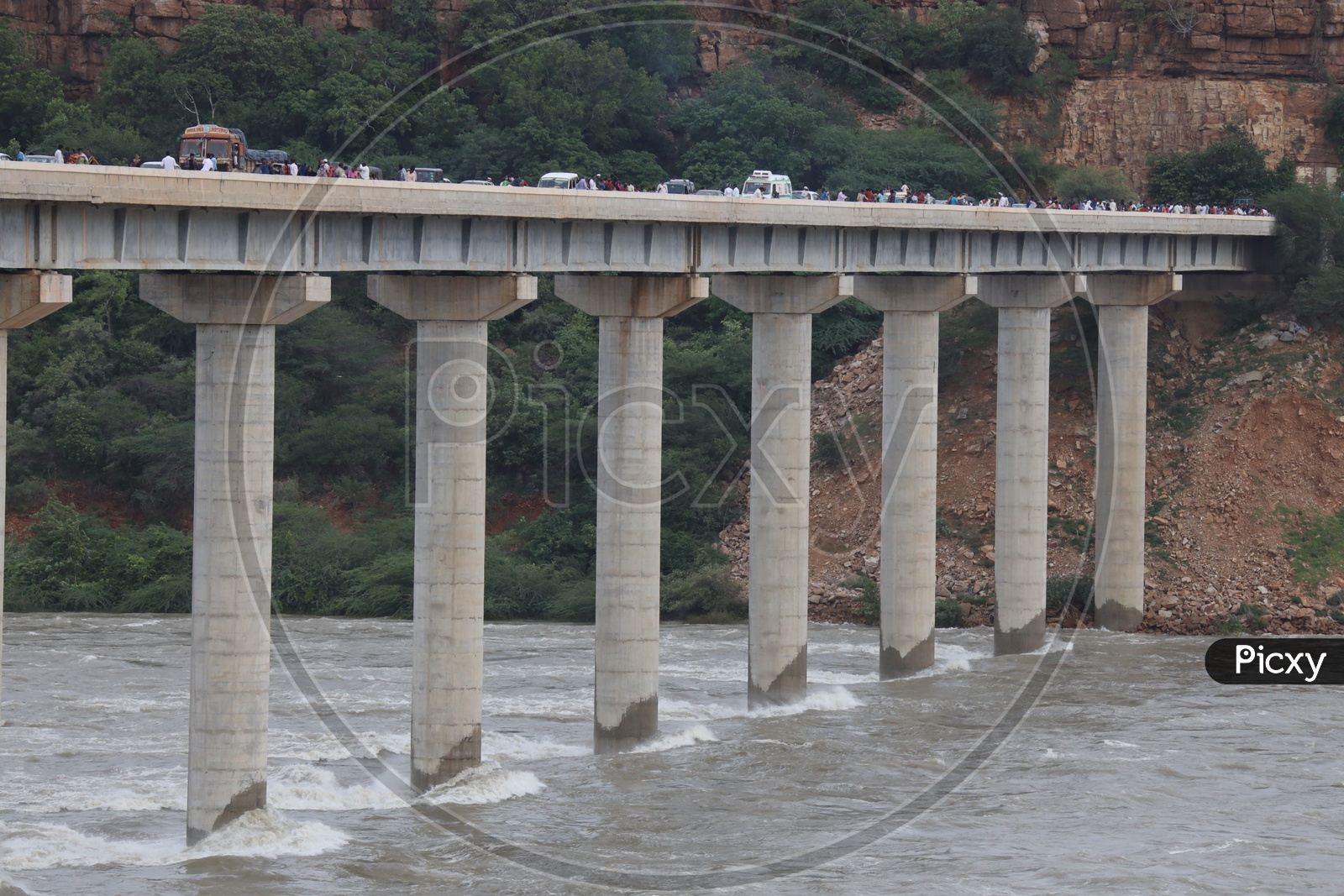 Image of Heavy Currents Striking The Bridge Pillars Due to Heavy Flood ...