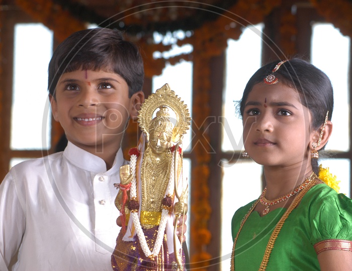 Image of Young Children Carrying Golden Idol of Lord Rama-VC390608-Picxy