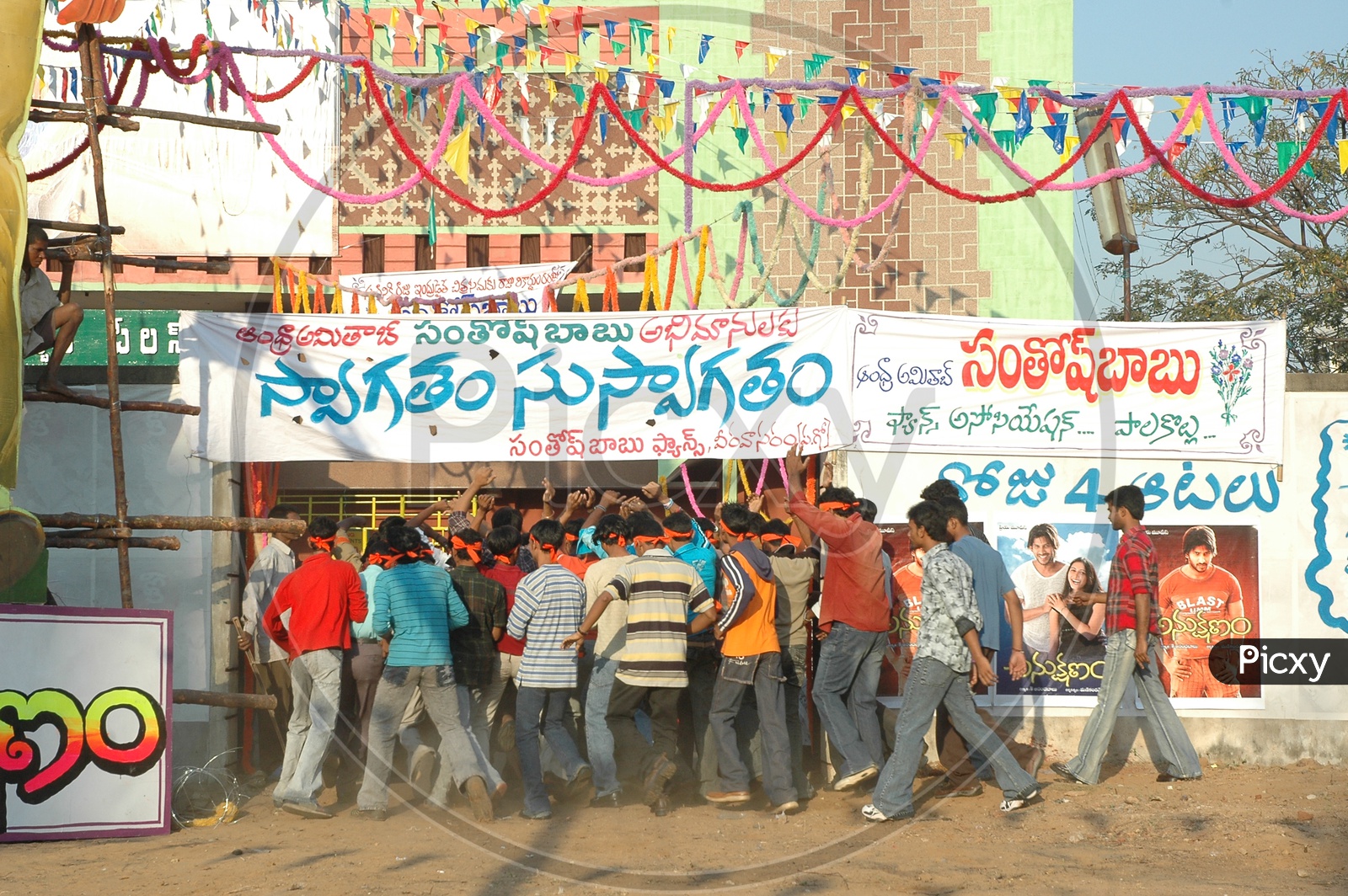 Image of Fans Celebrating Success of a Movie at Movie Theater-OW581528 ...