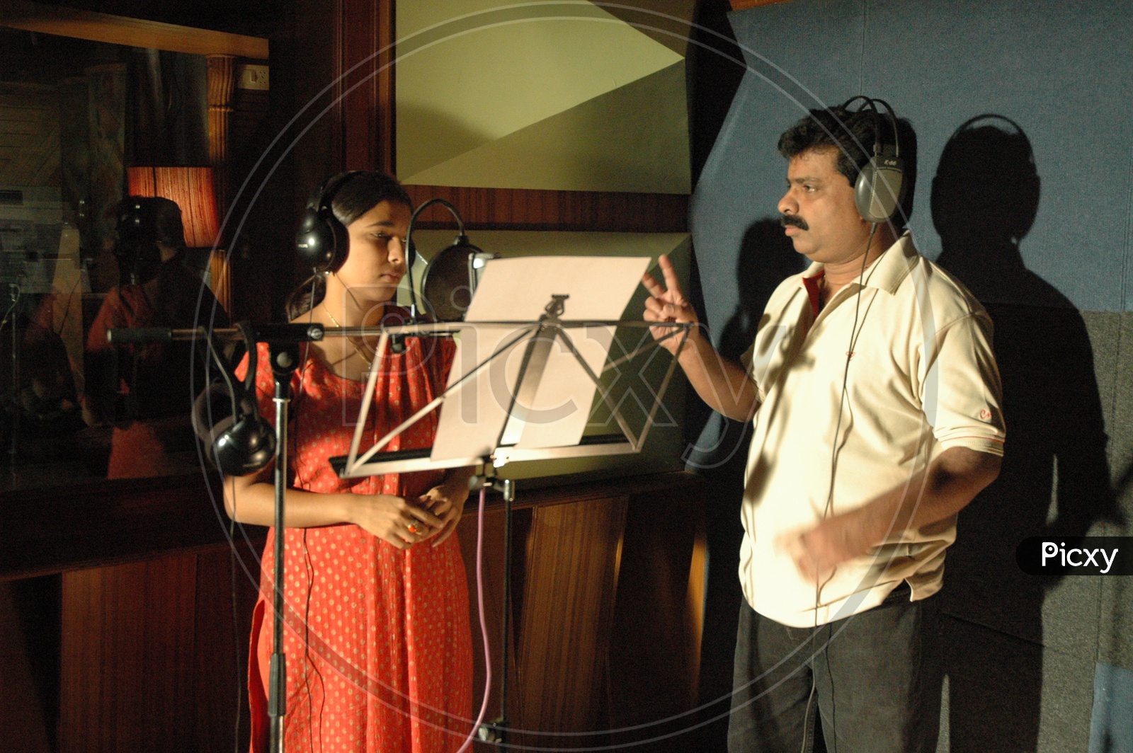 Image of Singers Singing in a Recording Studio-ZD298538-Picxy