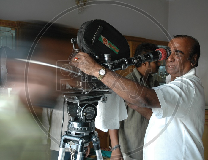 Image of Cinematographer with Movie Camera-NM599115-Picxy