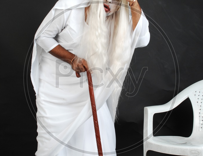 Image of Man in a Old Woman Getup for Movie-BL229926-Picxy