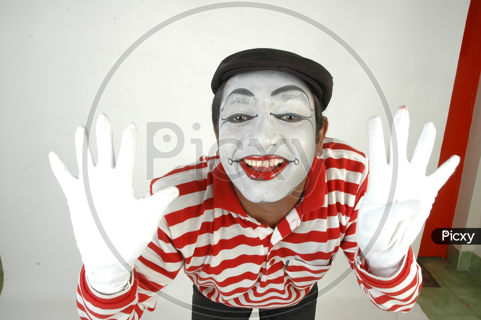 Image of Male Mime Artist With Gestures Isolated over White Background-FZ697273-Picxy