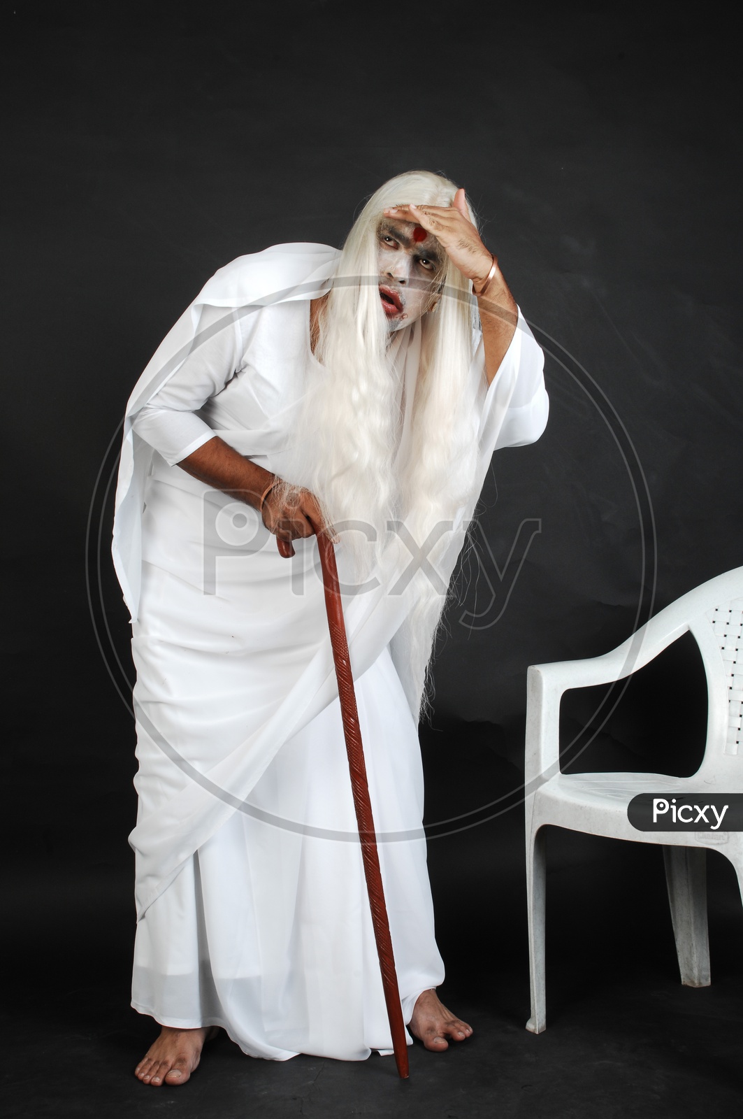 Image of Man in a Old Woman Getup for Movie-BL229926-Picxy