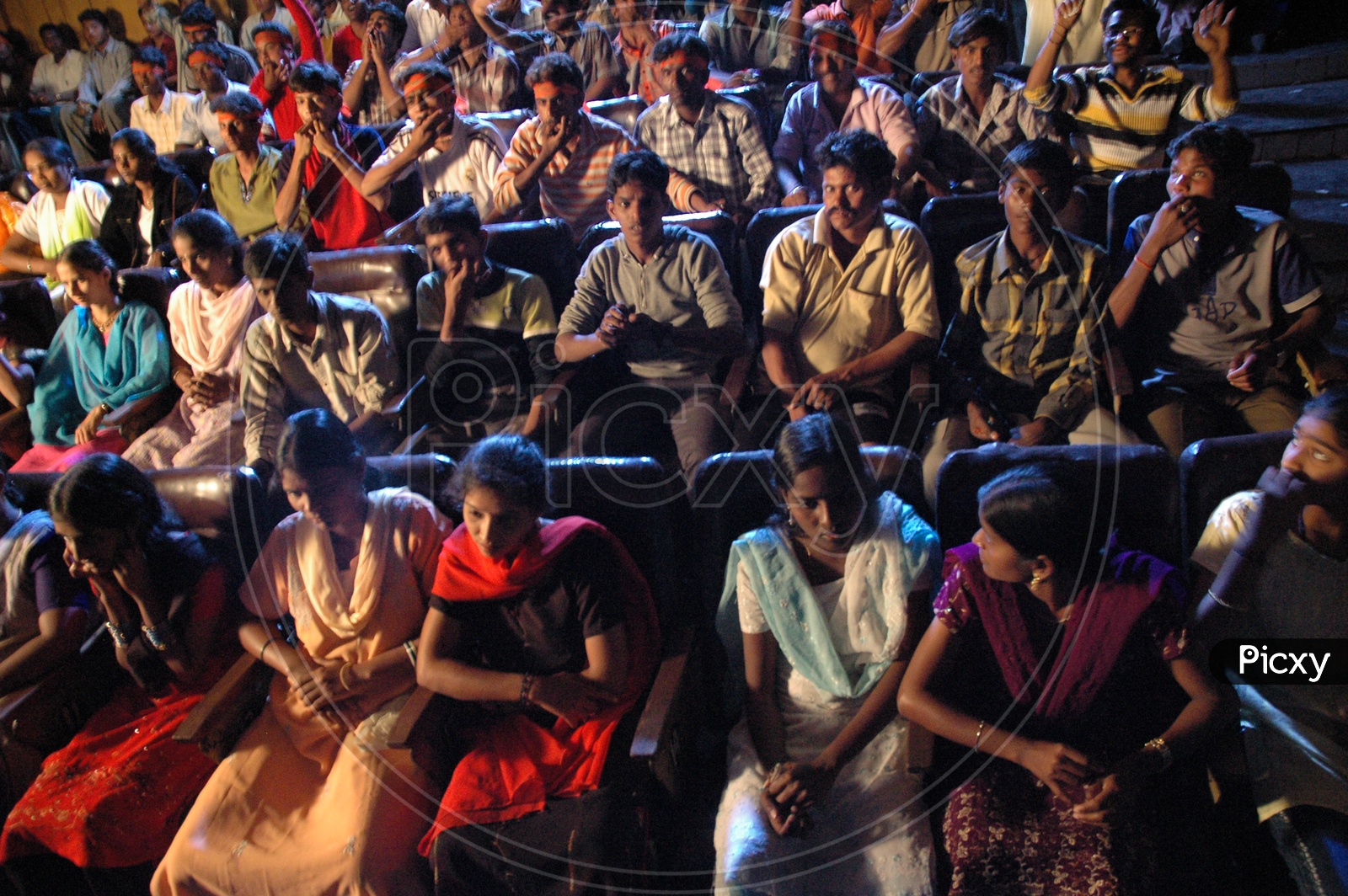 Image of Fans in a Movie Theater-QC488714-Picxy