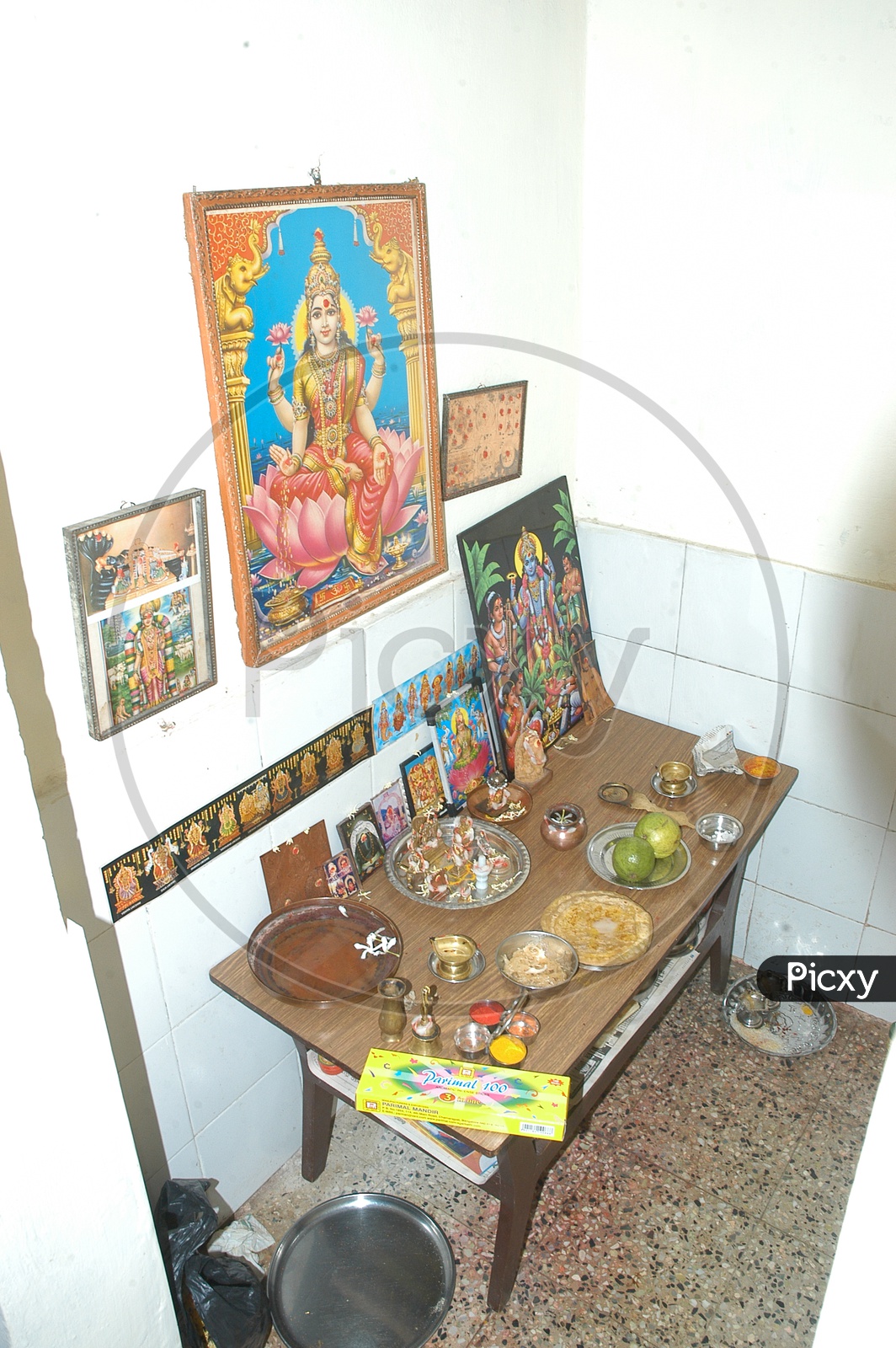 Image of Hindu God Photo Frames in a House Pooja Room-NL192450-Picxy