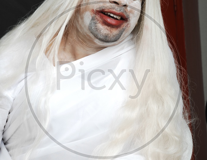 Image of Man in a Old Woman Getup for Movie-MW826659-Picxy