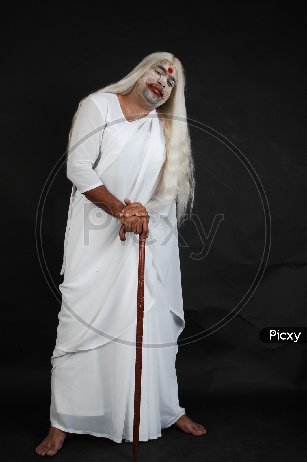 Image of Man in a Old Woman Getup for Movie-TY145918-Picxy