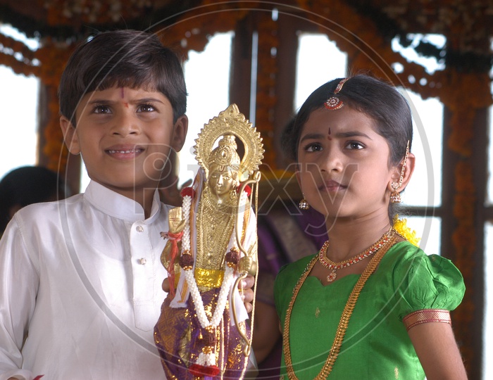Image of Young Children Carrying Golden Idol of Lord Rama-VC390608-Picxy