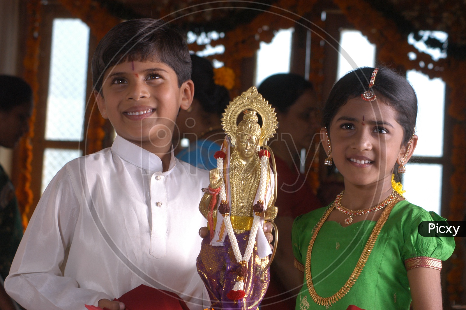 Image of Young Children Carrying Golden Idol of Lord Rama-VC390608-Picxy