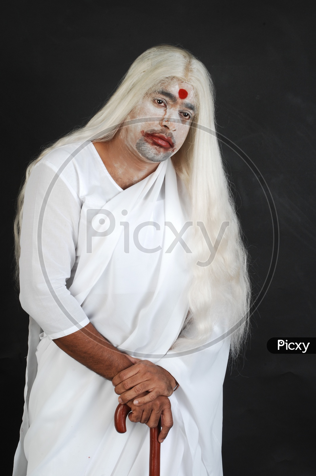 Image of Man in a Old Woman Getup for Movie-HT309716-Picxy