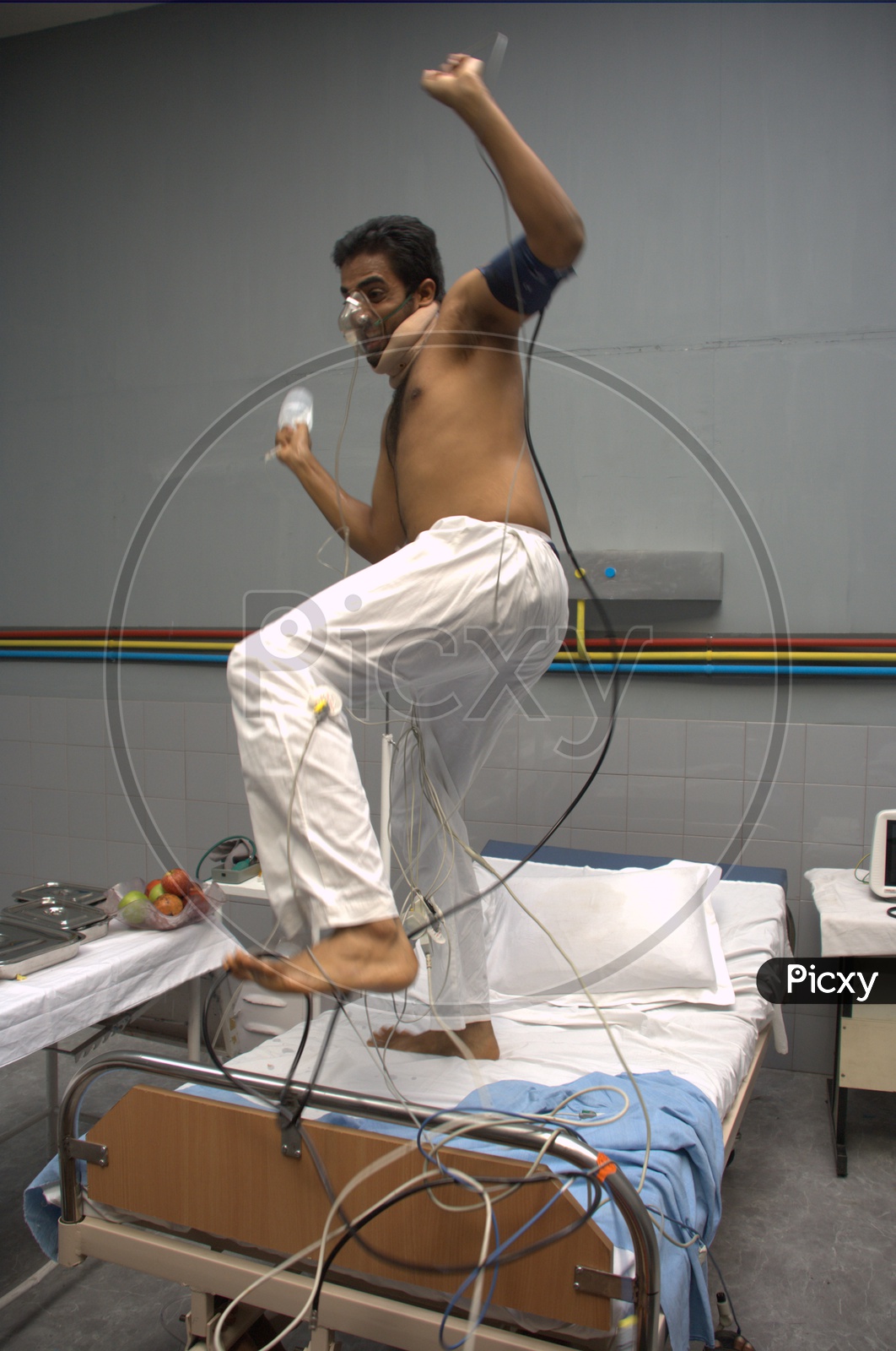 Image of Patient abnormal Behavior on a Hospital Bed-FY681585-Picxy