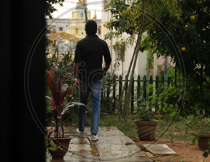 Image of A man leaving the House-NW248258-Picxy