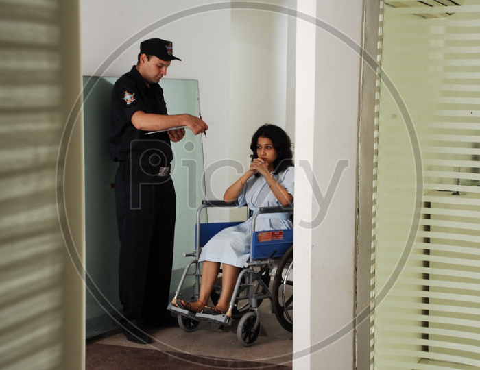 Image of Police taking Details From a Patient In a hospital ward ...