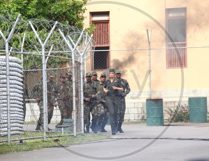 Image of military Man Marching with Guns For a Movie Shooting-QU478293 ...