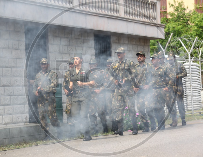 Image of military Man Marching with Guns For a Movie Shooting-WX053428 ...
