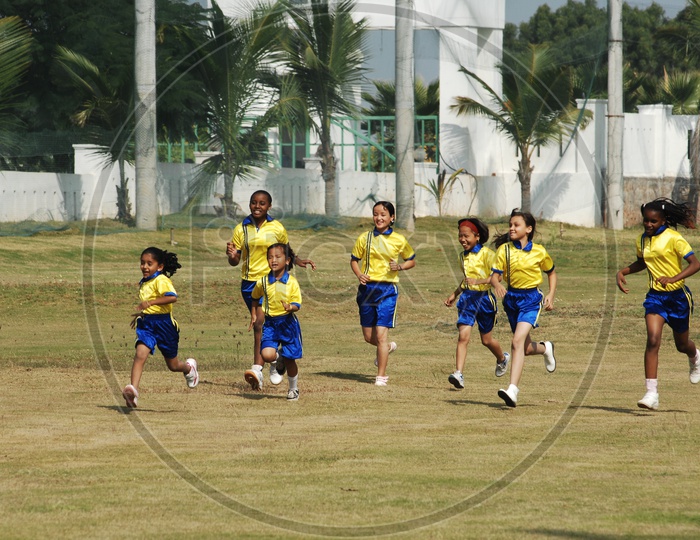Image of Girl Children Participating In a Running Race-RL446260-Picxy