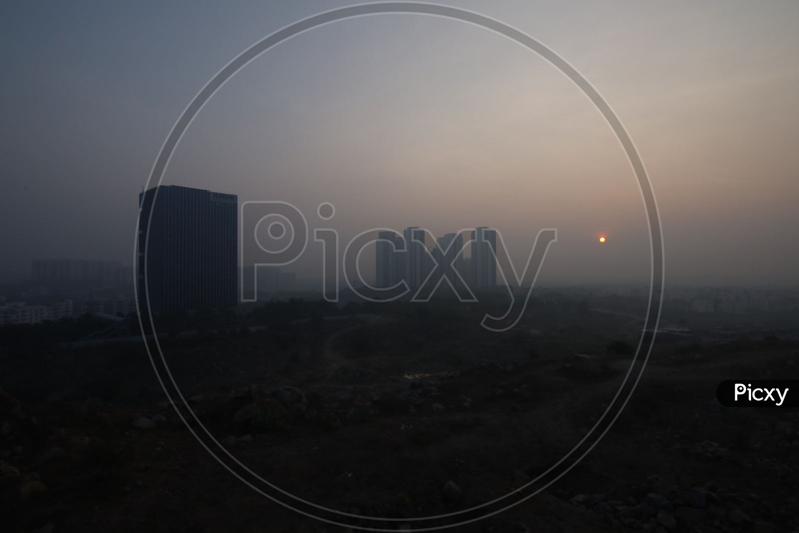 Image of A View of High Rise Apartment Buildings from a Hill top With ...