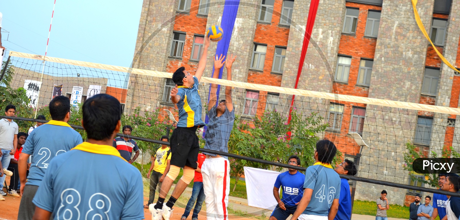 Image of Students Playing Volleyball In a Institute Campus-EB919187-Picxy