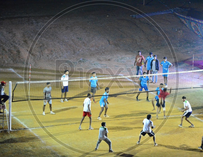 Image of Young Players Students Playing Volleyball in a College Campus ...