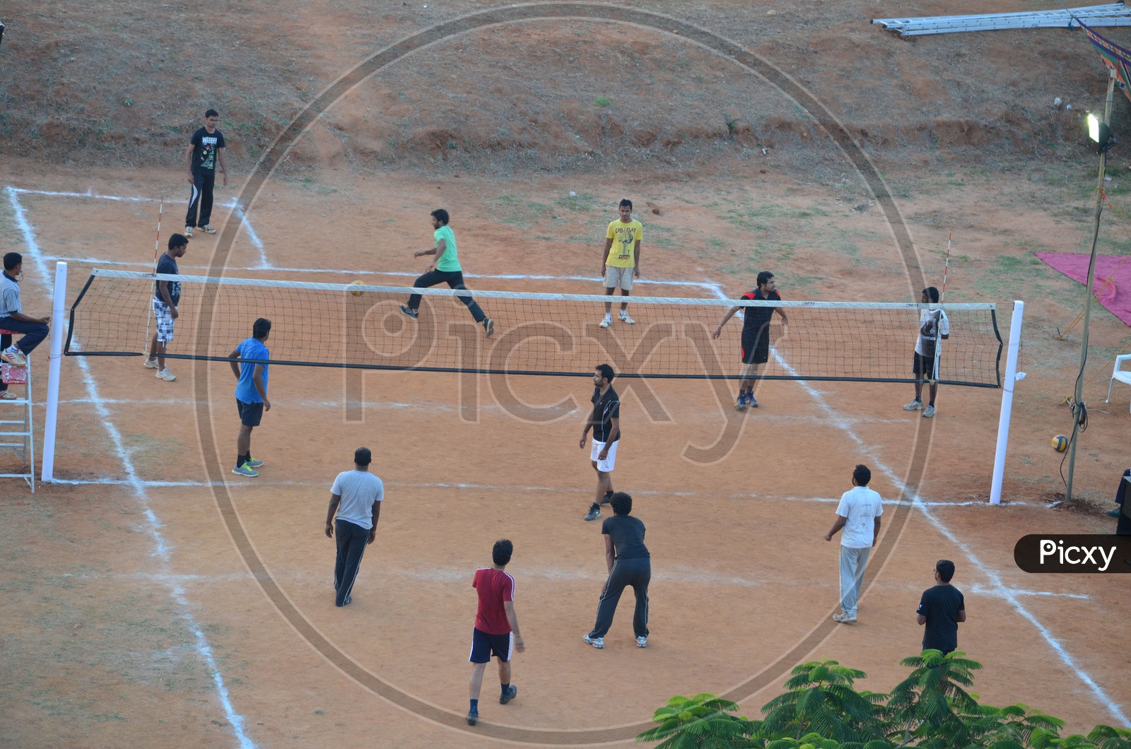 Image of Young Players Students Playing Volleyball in a College Campus ...