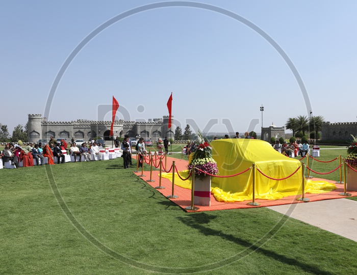 Image of A Car Covered With a veil in an Auction-PM372836-Picxy