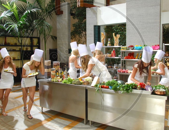 Image of Lady Chefs Woman Chefs Cooking in a Kitchen-MF834577-Picxy