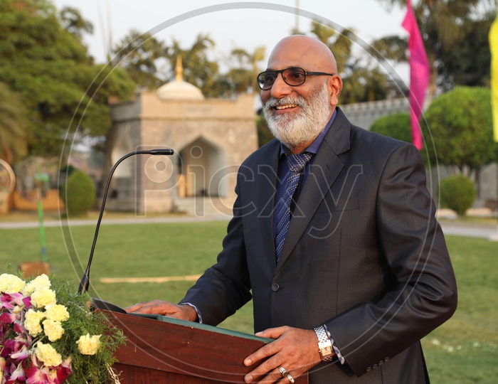 Image of Indian Man With Beard Speaking At a Dias on Stage-VA275458-Picxy