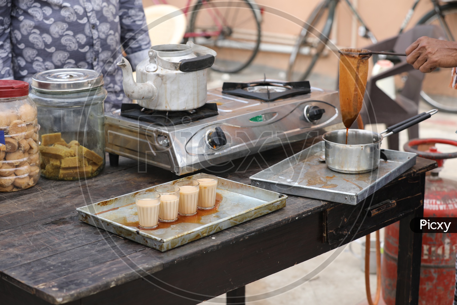 Image of Tea Vendor Stall Or tea Stall Or Chai Shop-YM327272-Picxy