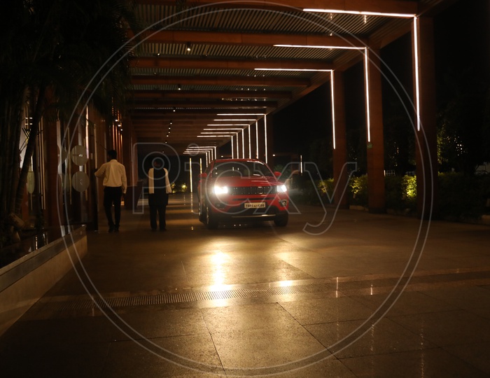 Image of A Car Entering to a Lobby Of a Hotel Or Residency-ON201145-Picxy