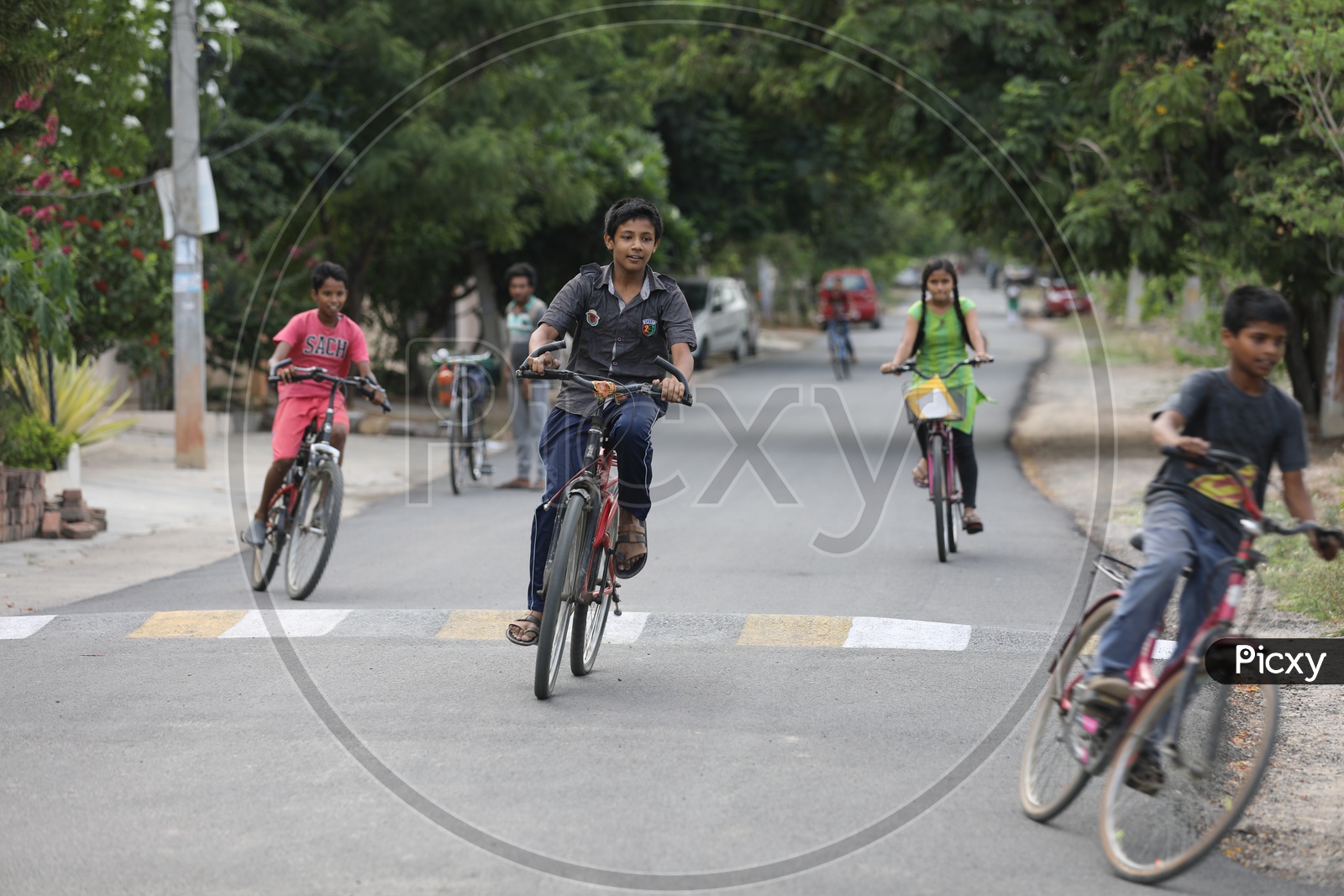 Image of Indian Rural Village Kids Or Children Riding Bicycles Or ...