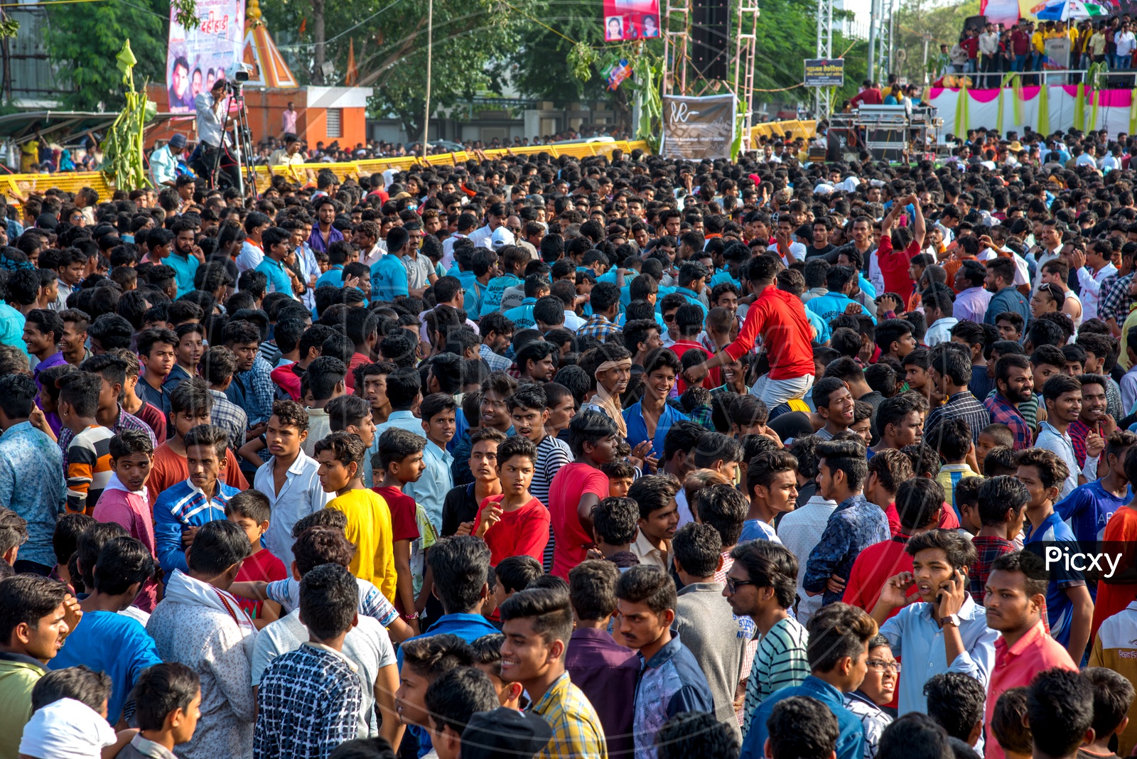 Image of Crowd Of Young Indian People Enjoying Making Human Pyramid At ...
